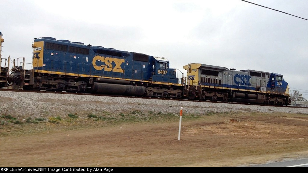 CSX 7824, 8407, and 2490 head WB